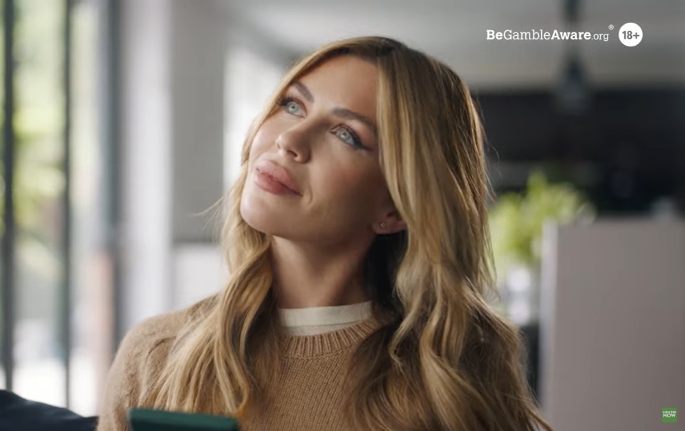 Abbey Clancy snuggles up to mystery man in new Paddy Power Games ad